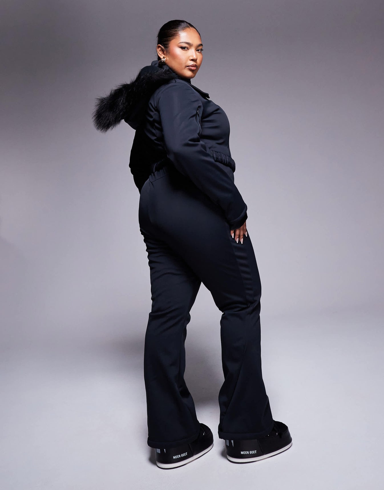 4505 Curve Icon belted ski suit with slim kick leg and faux fur hood i ...