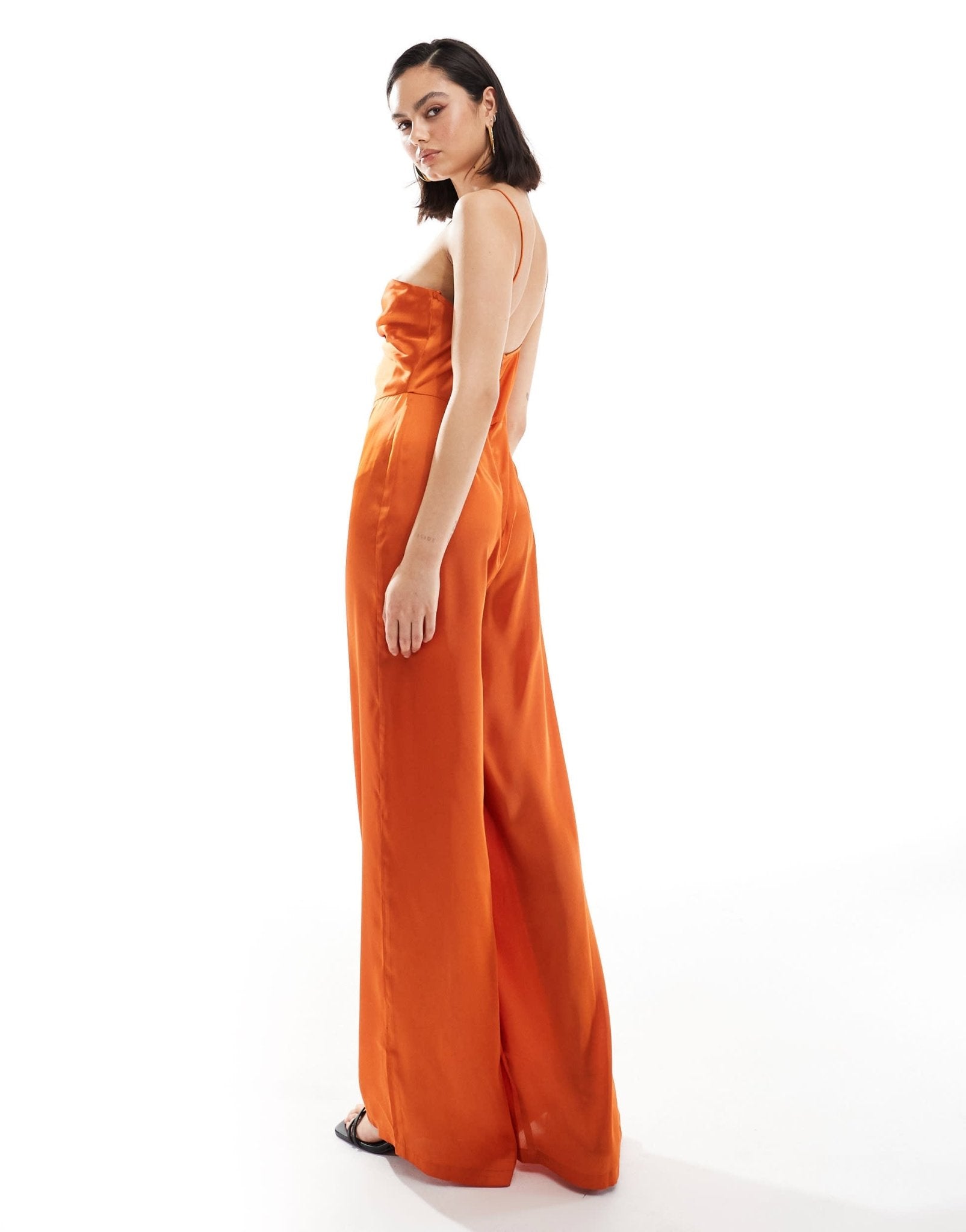 ASOS DESIGN halter tie ruched front straight leg satin jumpsuit in rus ...